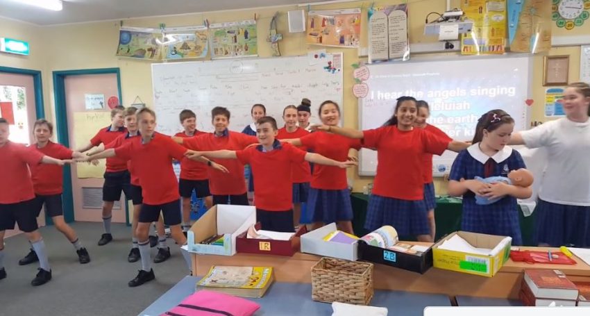 Fraser Coast Anglican College students practising for a performance